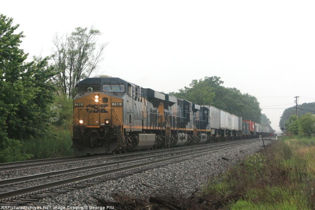 CSX 768 and train Q032